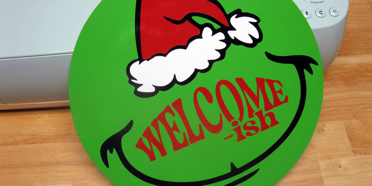 DIY Grinch Welcome-ish Sign: Christmas Cheer with Cricut Vinyl Magic ...
